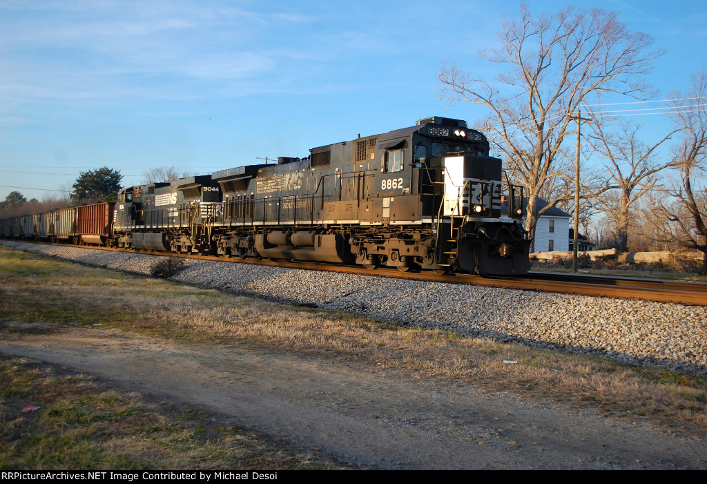 NS C40-9 #8862 leads an eastbound coal train across Maifield Rd.